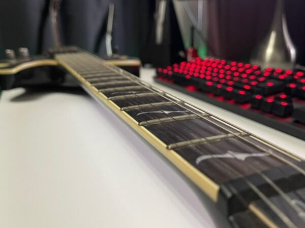 Why Did My Guitar String Break While Tuning Down?